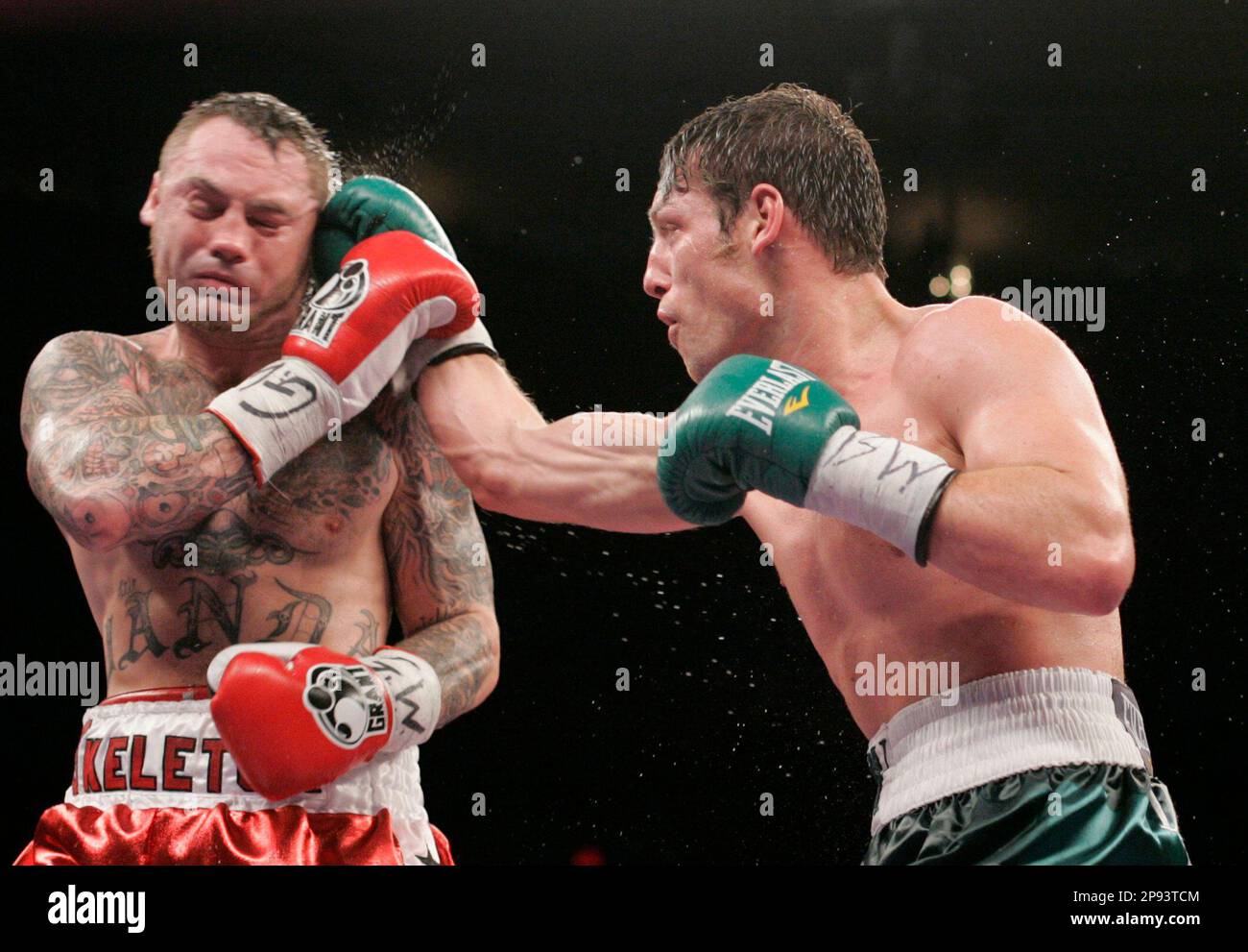 John Duddy, right, of Northern Ireland, punches Matt Vanda during the ...