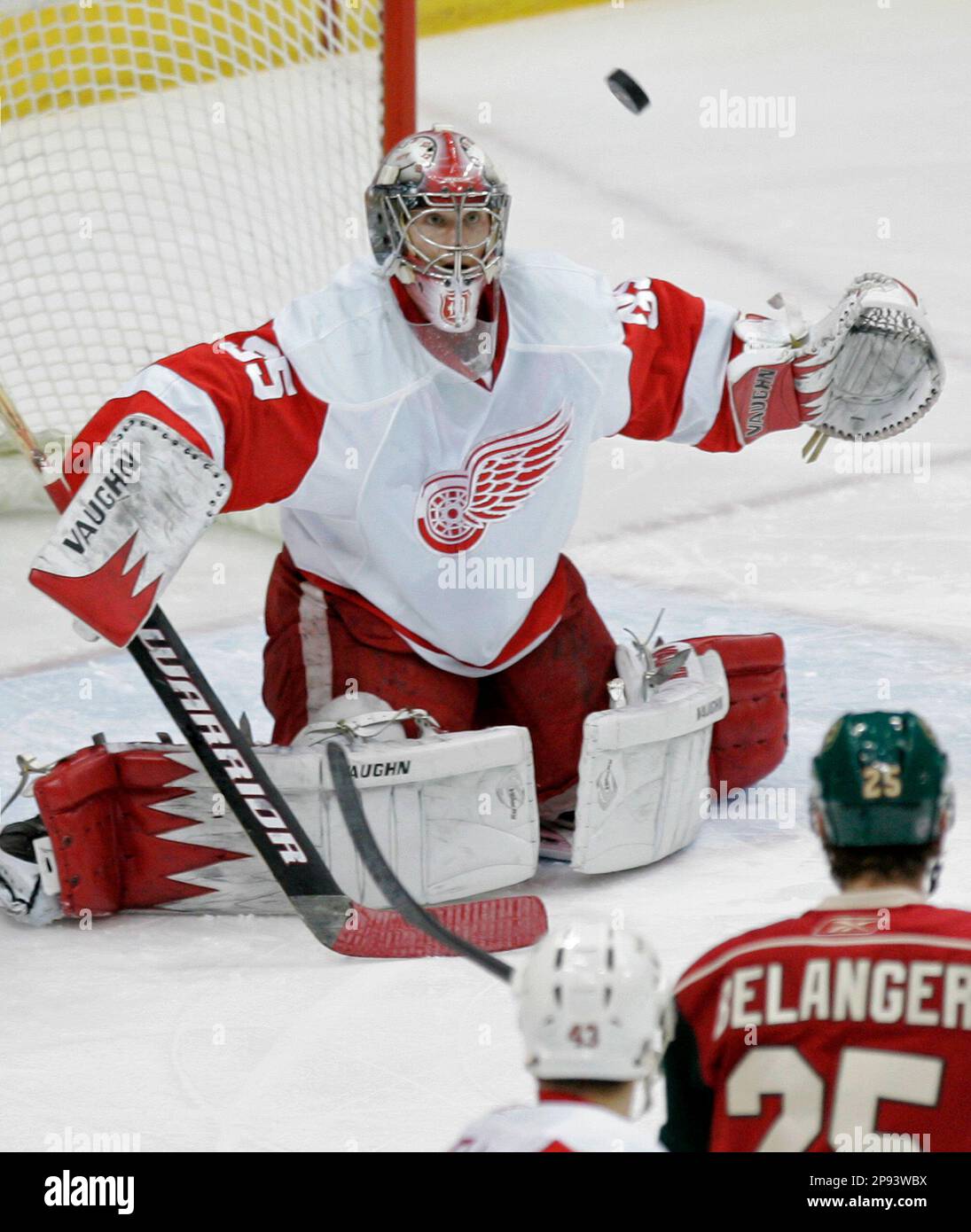 Detroit Red Wings goalie Jimmy Howard deflects a shot into the air as ...