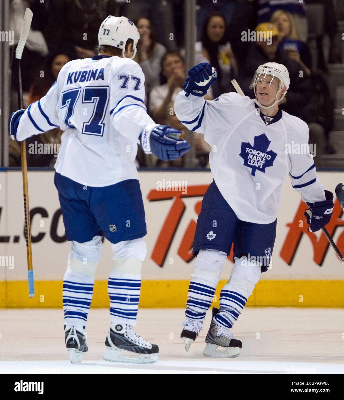 Toronto Maple Leafs left winger Jason Blake, right, celebrates his goal ...