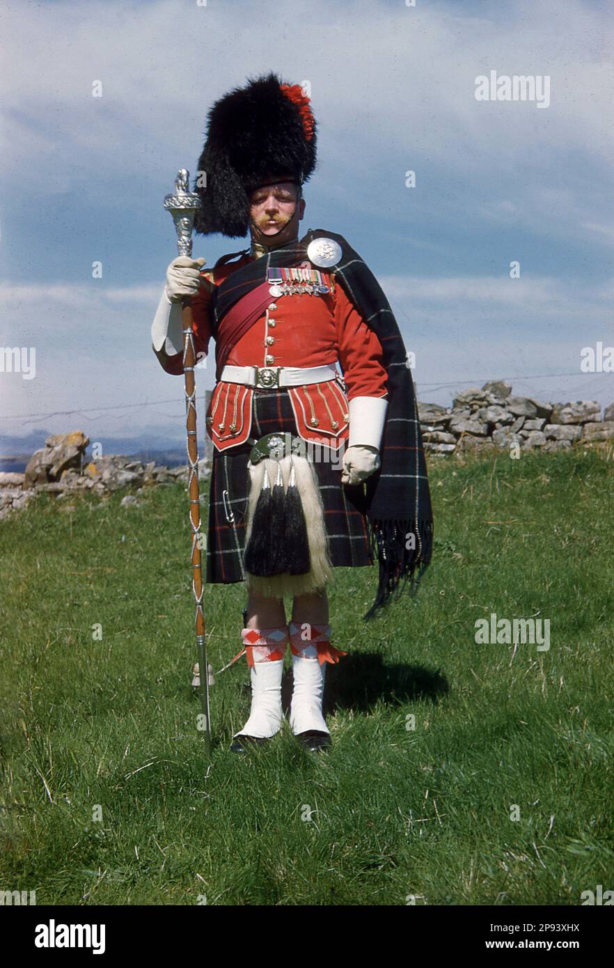 1960s, historical, a Highland Drum Major in his uniform and with ...