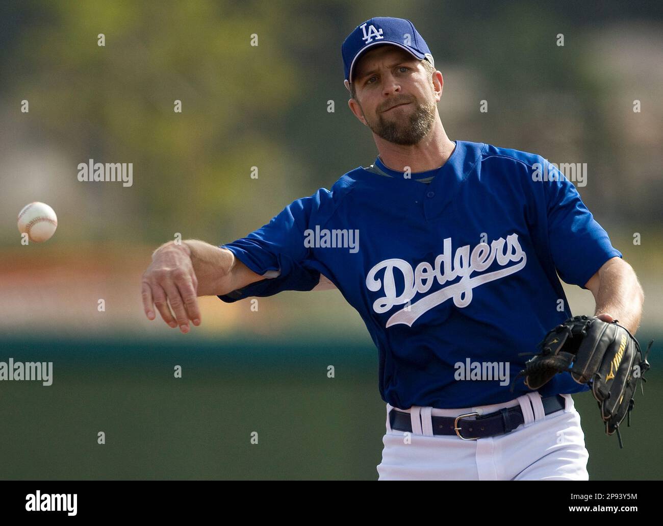 Los Angeles Dodgers' Casey Blake throws a ball during spring training ...