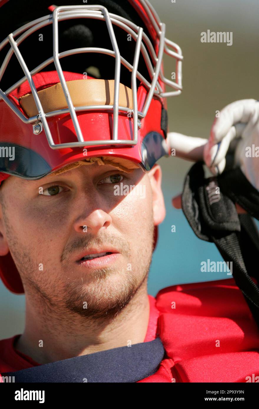 Boston Red Sox catcher Josh Bard adjusts his helmet during a baseball ...