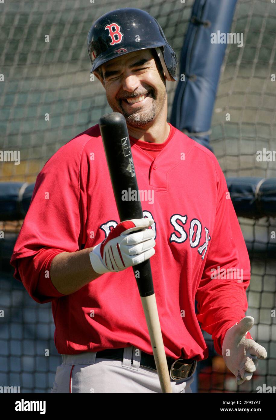 Boston Red Sox infielder Mike Lowell smiles at batting practice during ...