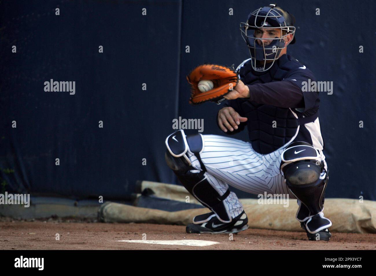 New York Yankees catcher Jorge Posada practices at the George M ...