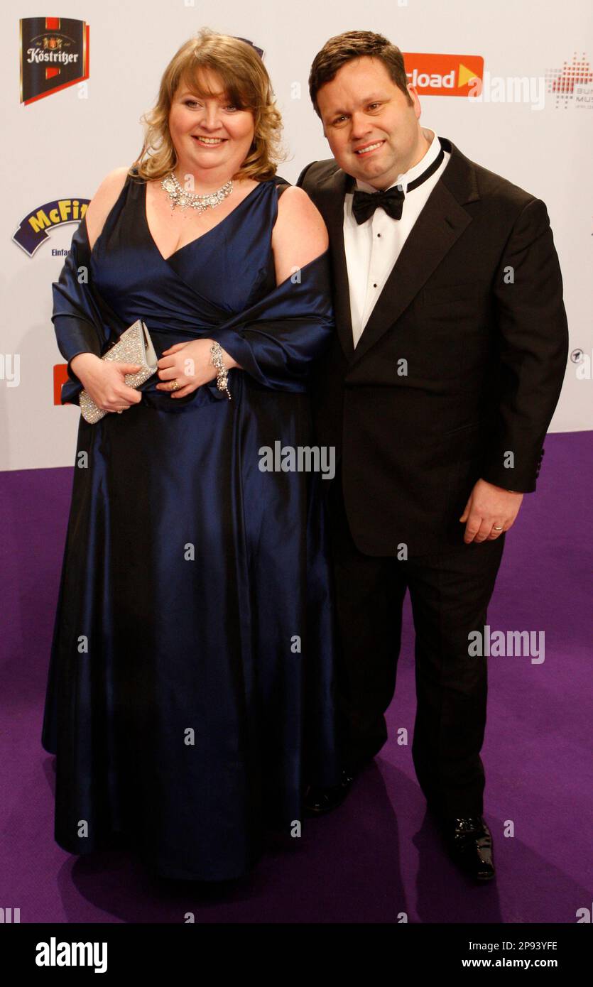 British tenor Paul Potts, right, and his wife Julie-Ann arrive for the ...