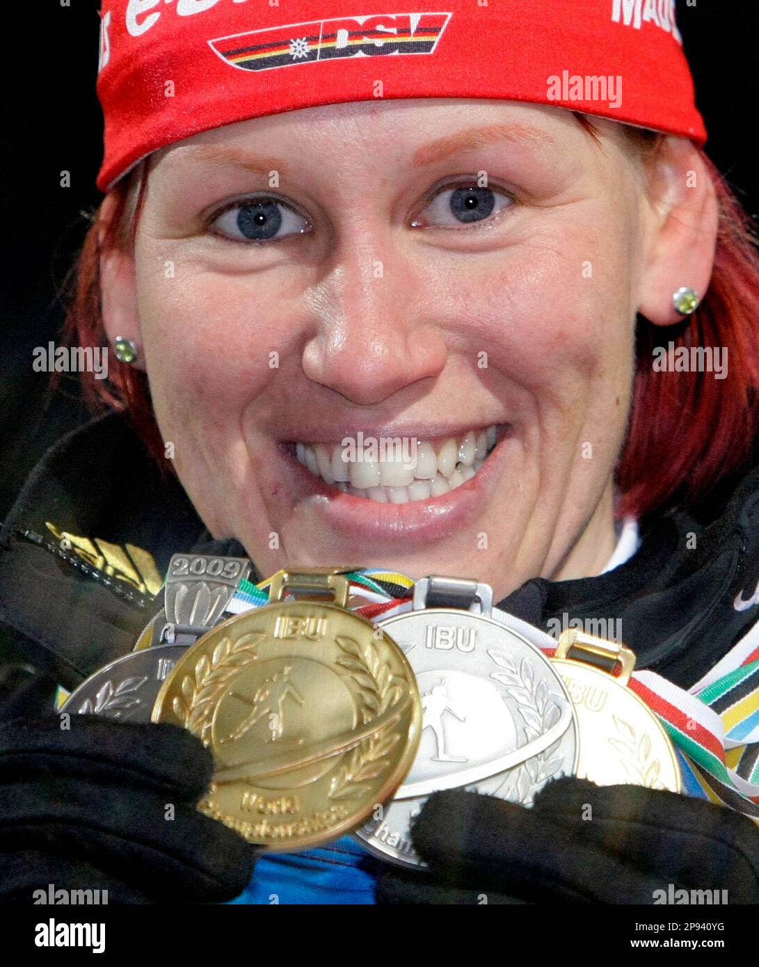 Germany's Kati Wilhelm poses for the photographers after a medal ...