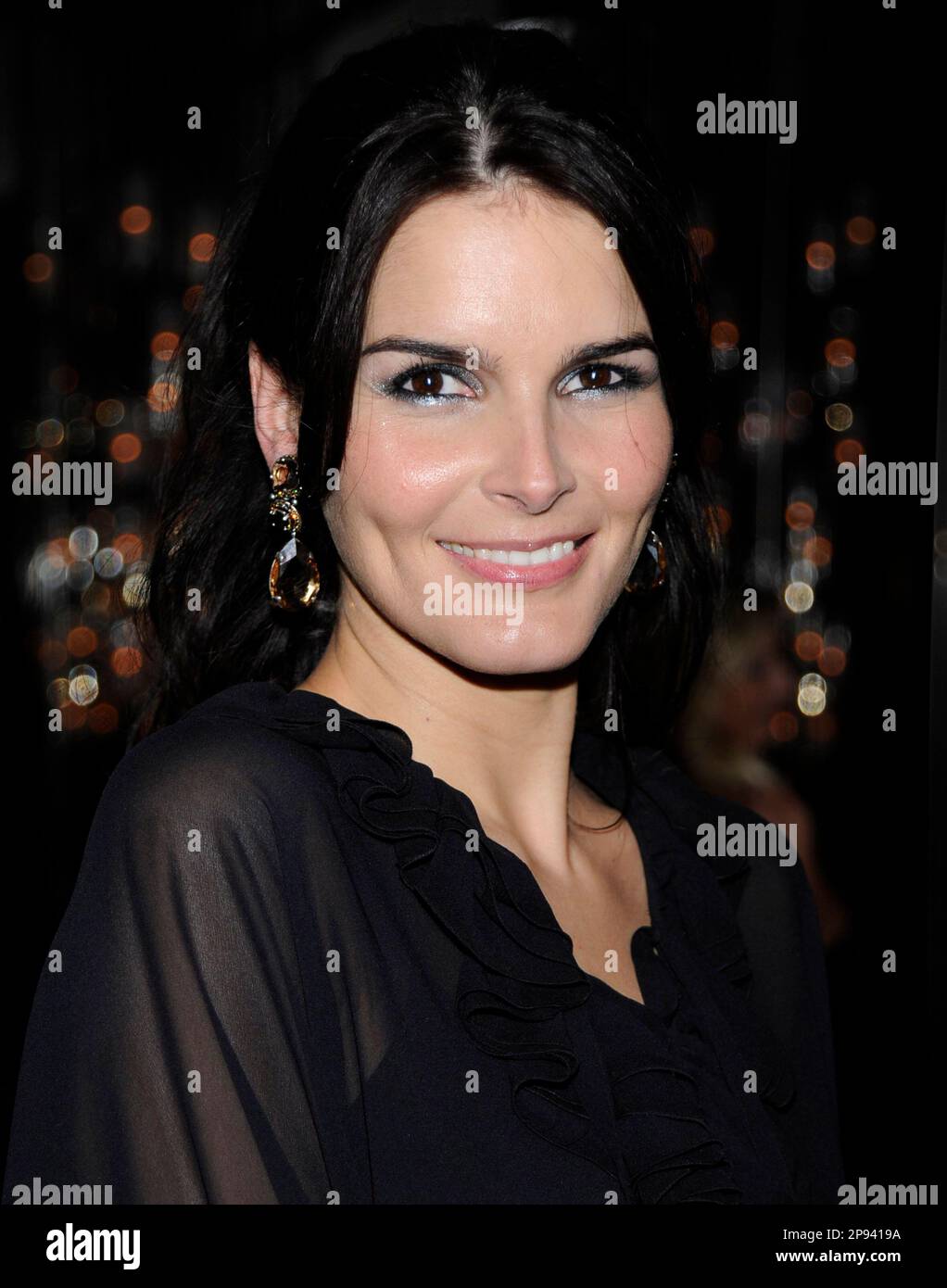 Actress Angie Harmon poses on the press line at the Vanity Fair/Bally ...
