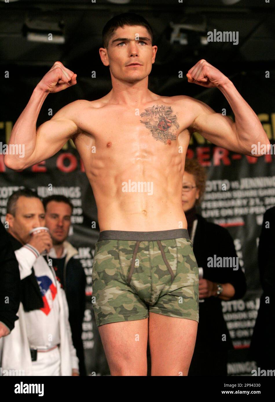 Boxer Michael Jennings, left, of England, poses for photographs at the ...