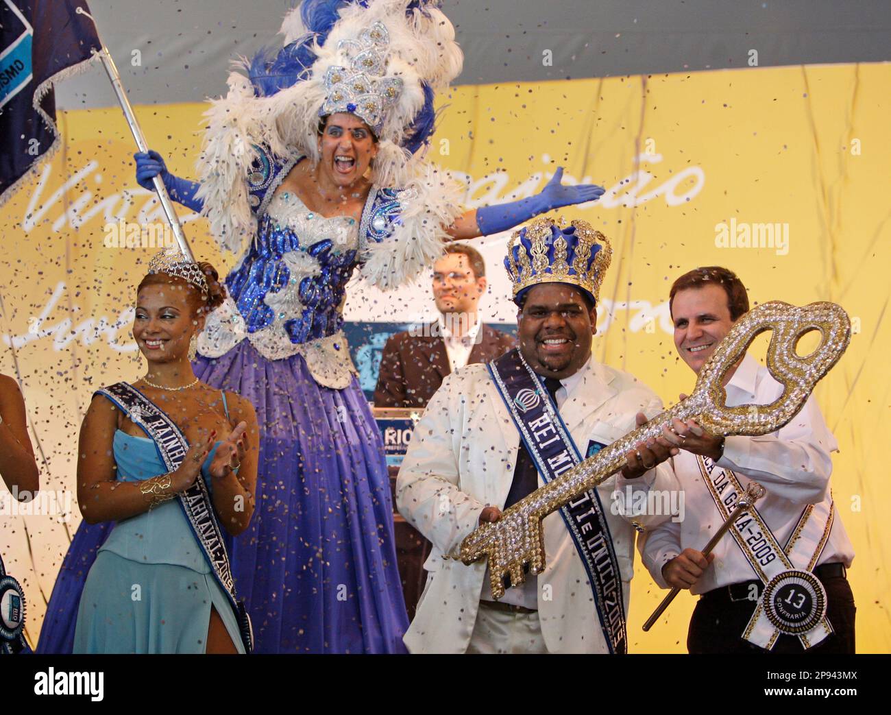 The Rei Momo, or Carnival King, second right, receives the key of the ...