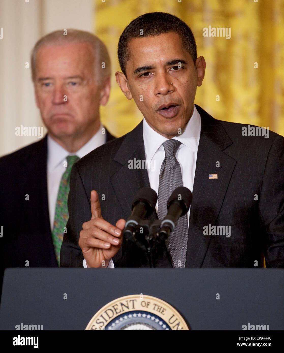 President Barack Obama, accompanied by Vice President Joe Biden, speaks ...