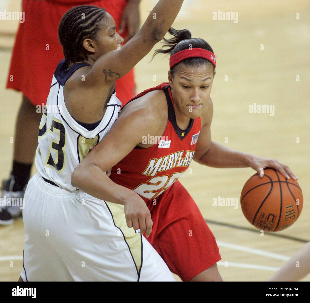 Maryland forward Marissa Coleman (25) tries to dribble around Georgia ...