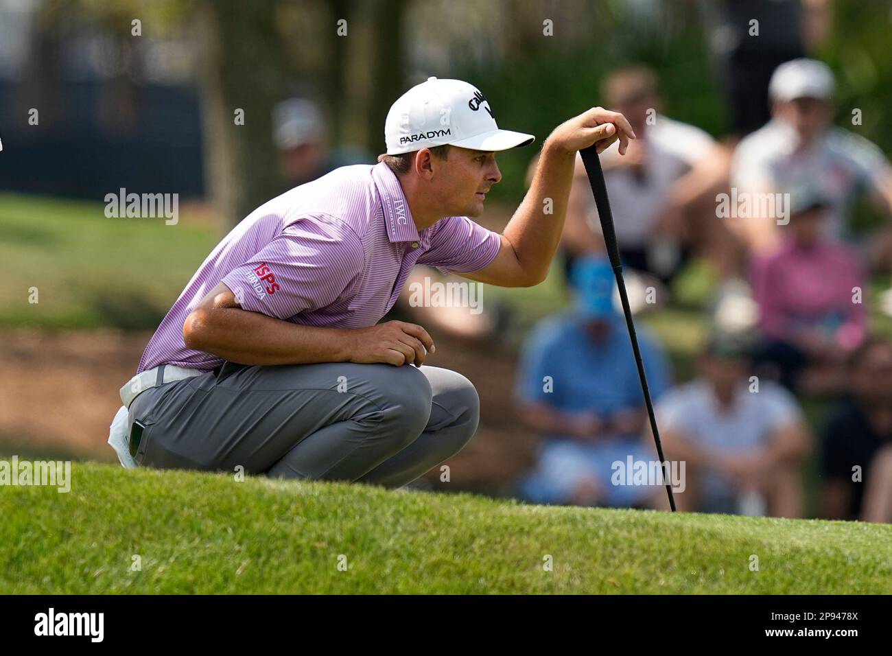 Christiaan Bezuidenhout, of South Africa, looks over his putt on the ...