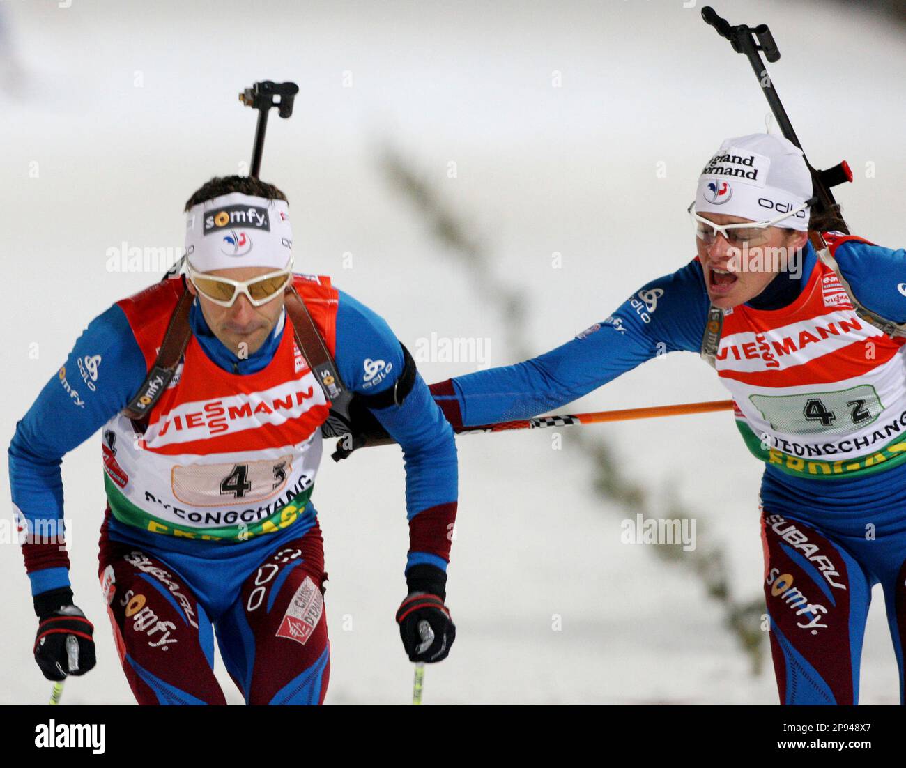 Sylvie Becaert, right, changes over to Vincent Defrasne, both from ...