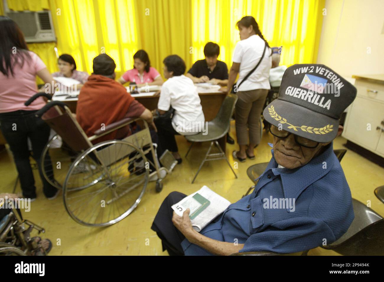 A Filipino war veterans waits an application procedure at the Veterans ...