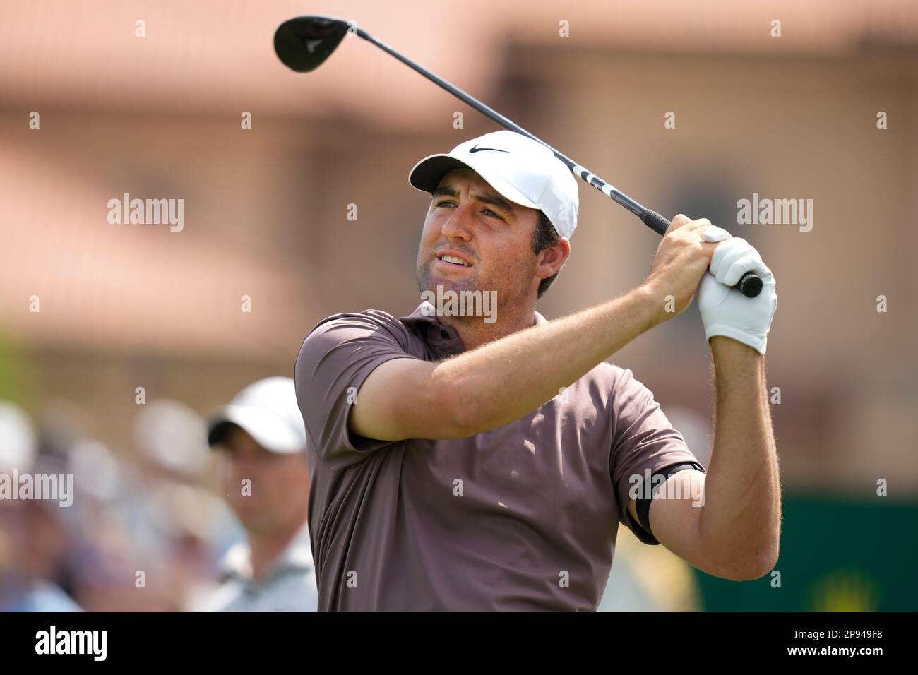 Scottie Scheffler watches his drive from the first tee during the ...