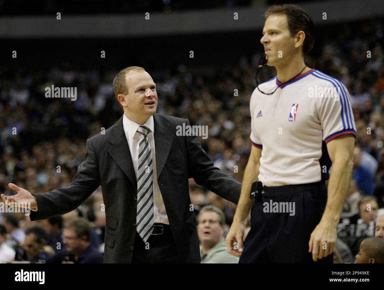New Jersey Nets coach Lawrence Frank, left, looks for call from referee ...