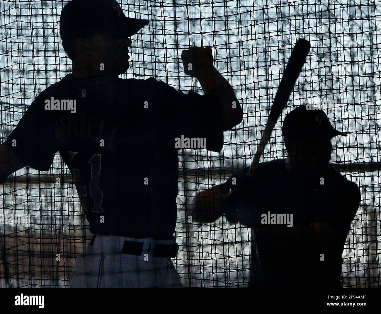 San Diego Padres Pitcher Mark Worrell Left And An Unidentified Teammate Workout In A Batting