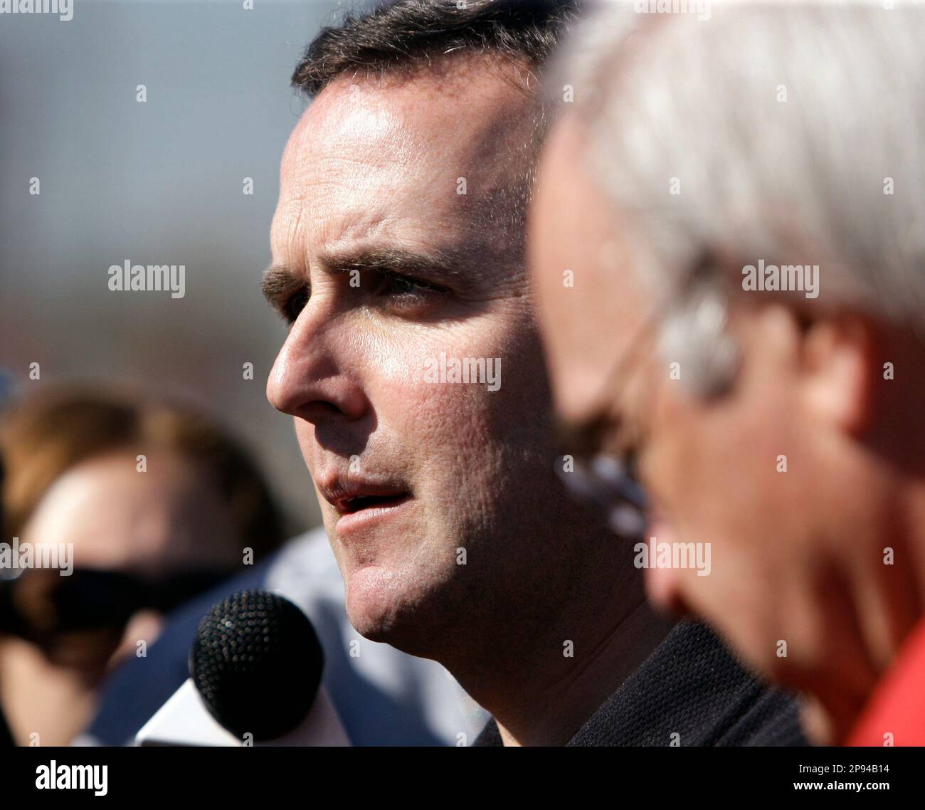 Arizona Diamondbacks president and CEO Derrick Hall, center, speaks to ...