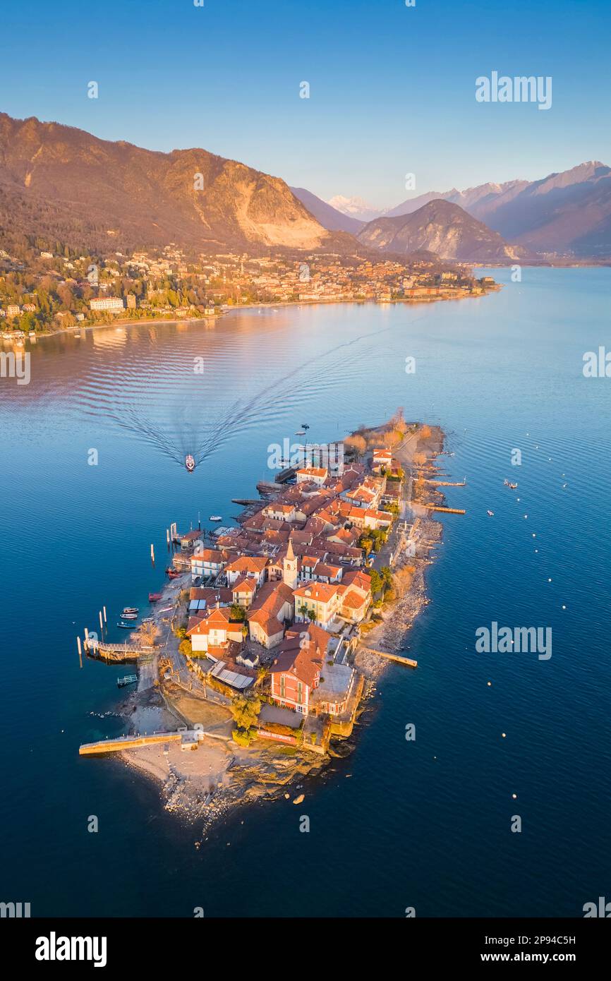 Aerial view of Isola dei Pescatori during a winter sunrise. Lago ...