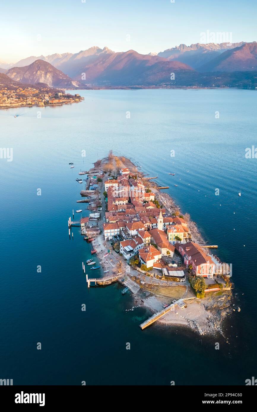Aerial view of Isola dei Pescatori during a winter sunrise. Lago ...