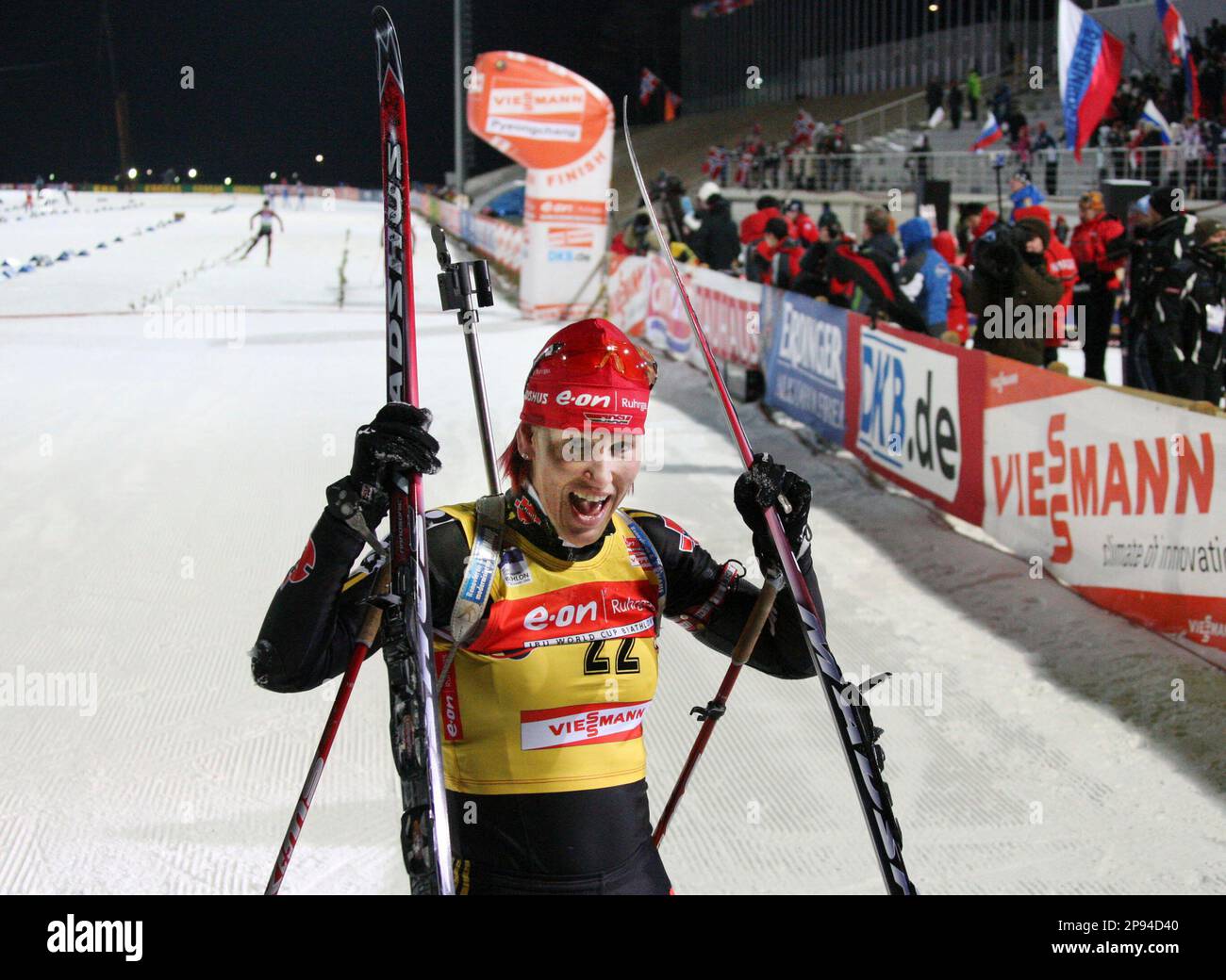 Kati Wilhelm of Germany reacts after she crossing the finish line as ...