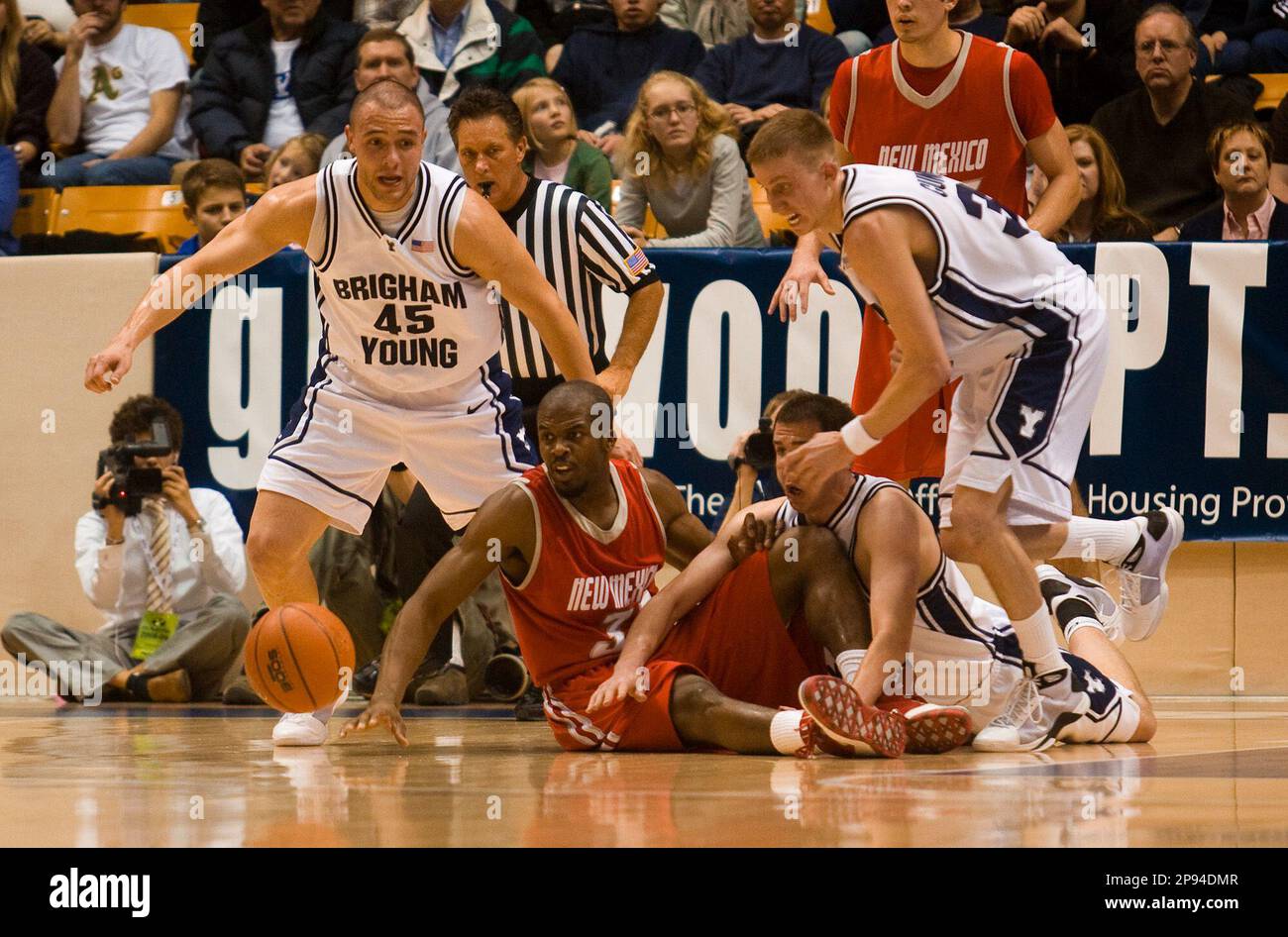 Brigham Young's Lee Cummard, right, Jonathan Tavernari (45), of Brazil ...