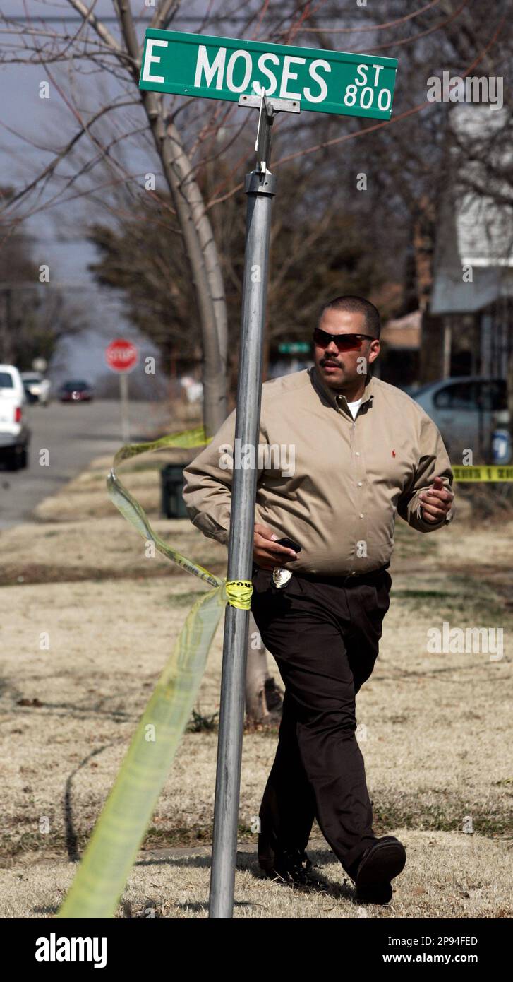 Cushing Police Chief Terry Brannon crosses the crime scene tape at the ...