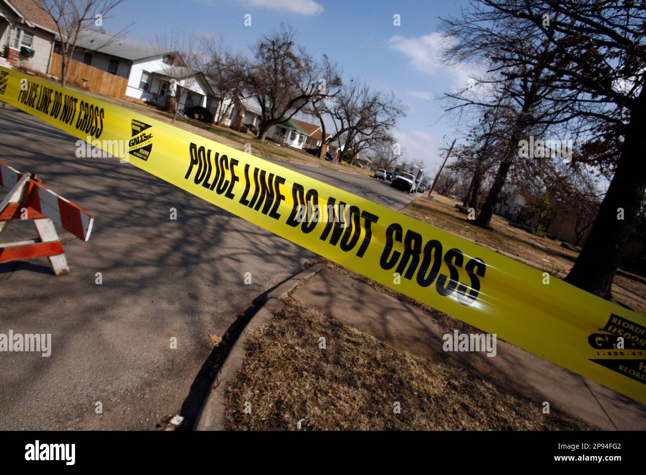 Crime scene tape stretches across the 800 block of E. Moses Ave. in ...