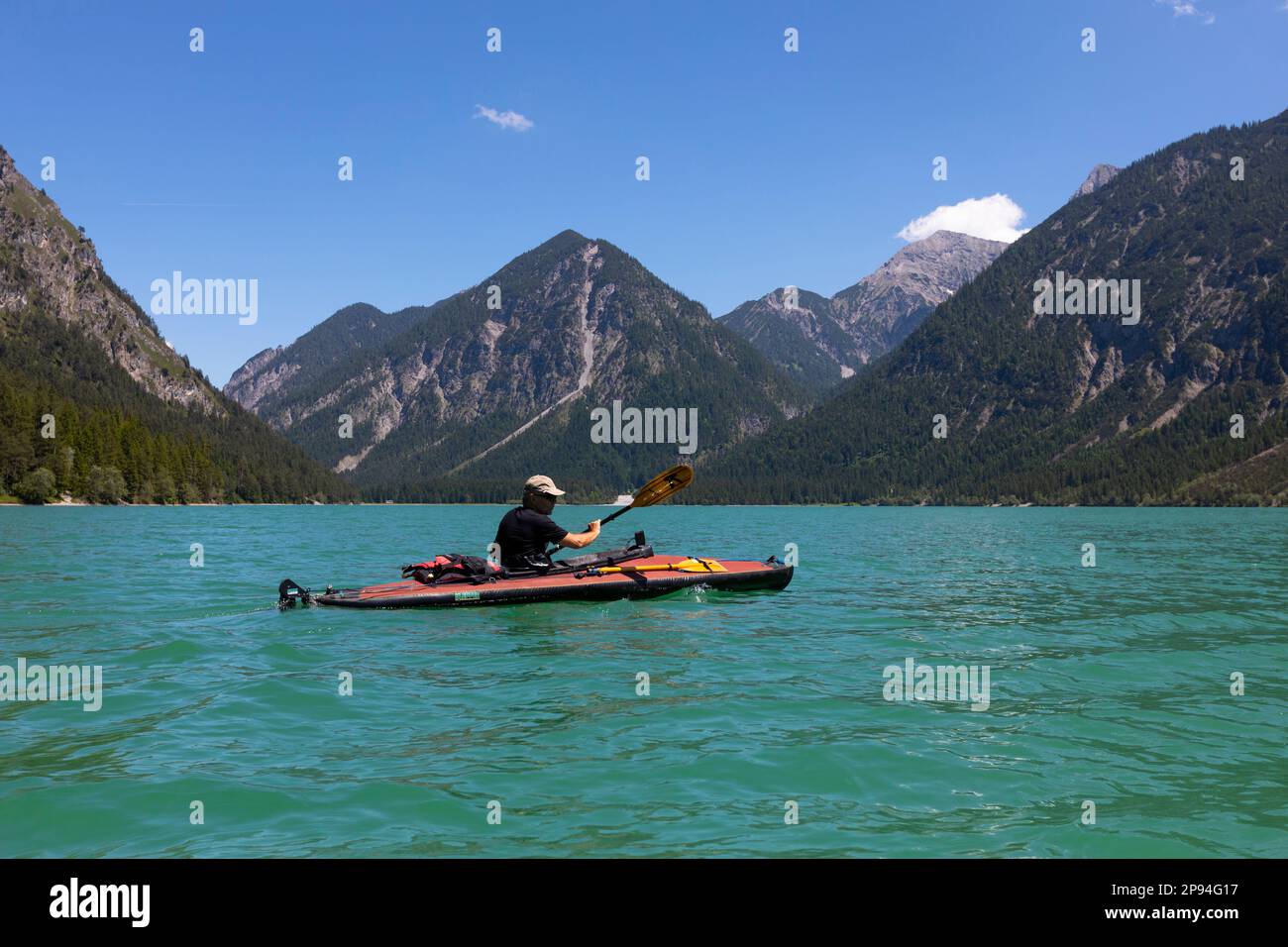 Sea kayaker (60 years) on Lake Heiterwang Stock Photo - Alamy