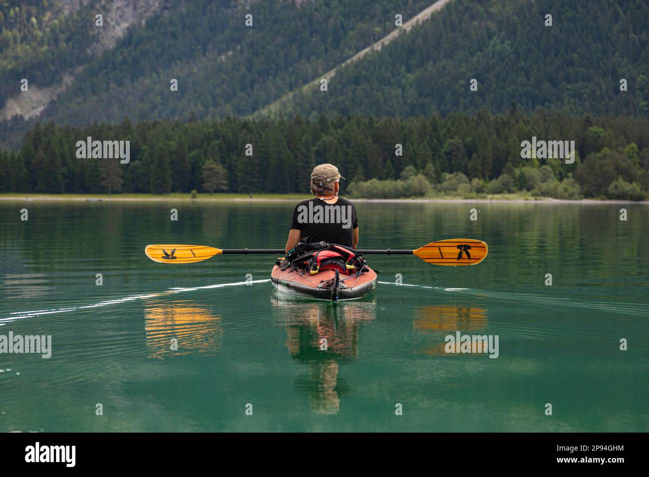 Sea kayaker (60 years) on Lake Heiterwang Stock Photo - Alamy