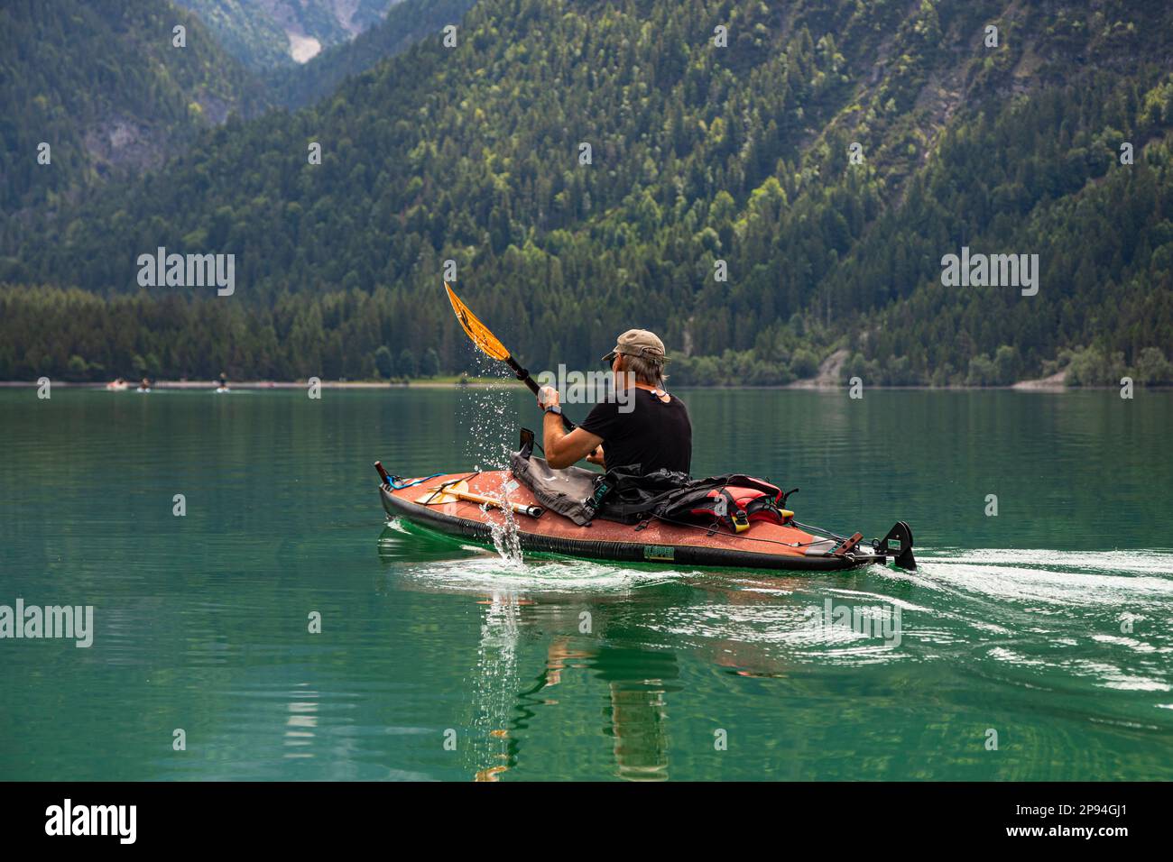 Sea kayaker (60 years) on Lake Heiterwang Stock Photo - Alamy