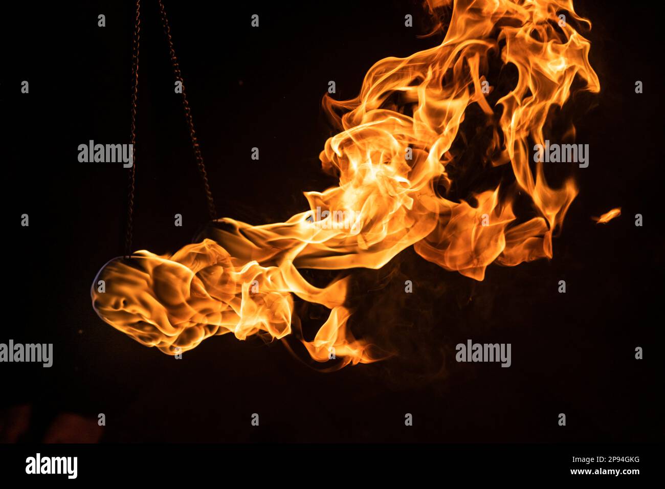 Street performer at night with fire show Stock Photo - Alamy
