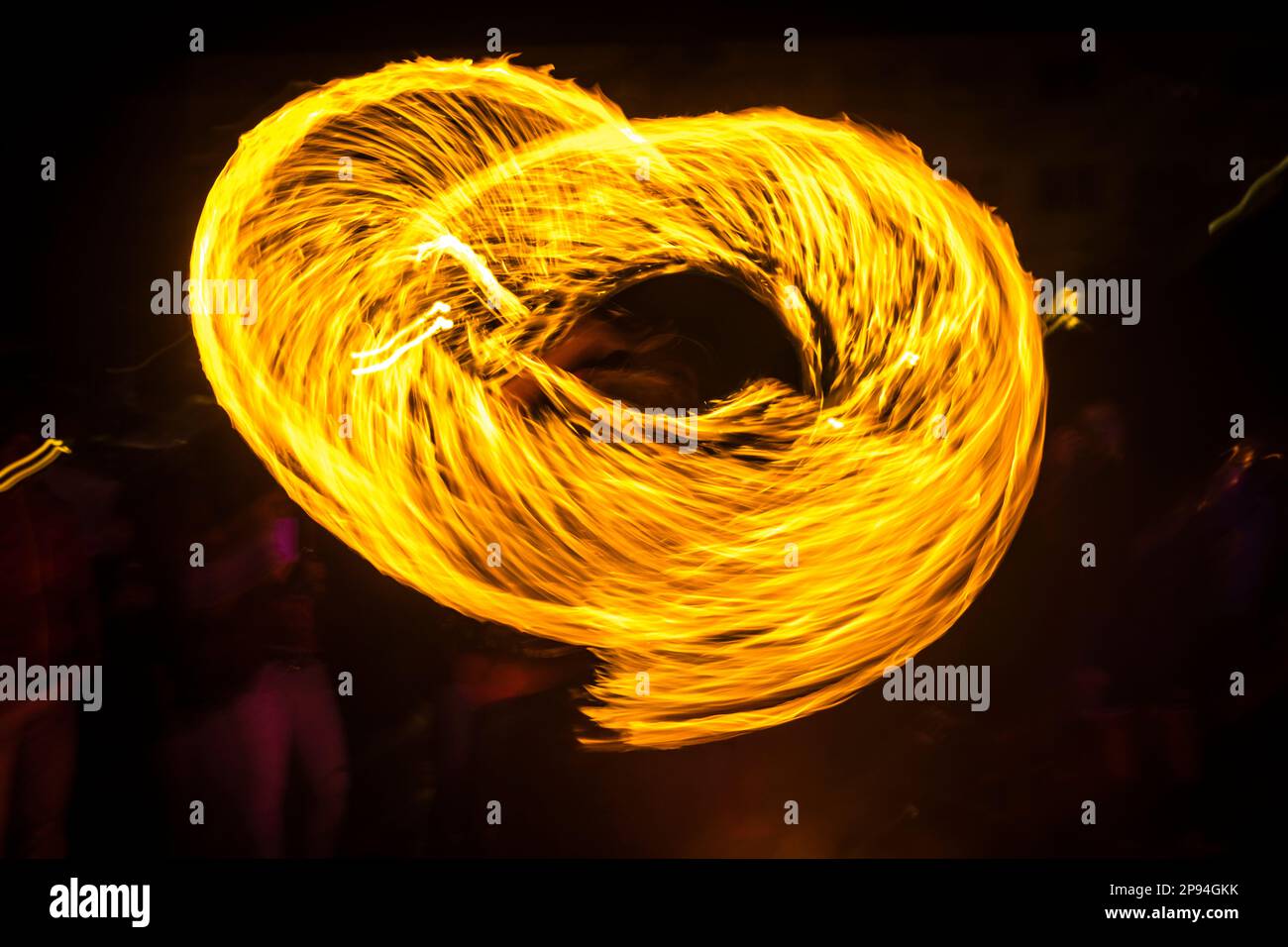 Street performer at night with fire show Stock Photo - Alamy