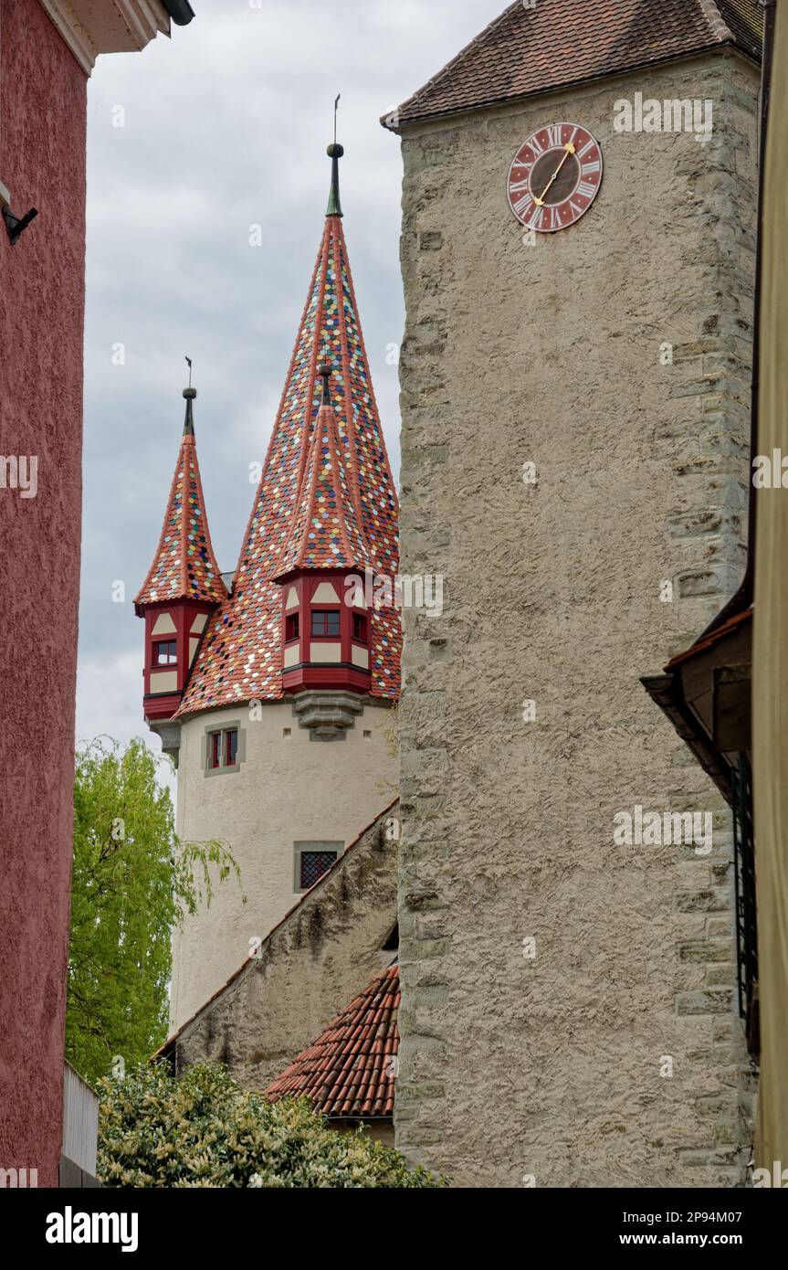 A view of a medieval castle with colorful roof tiles in Lindau, Germany ...