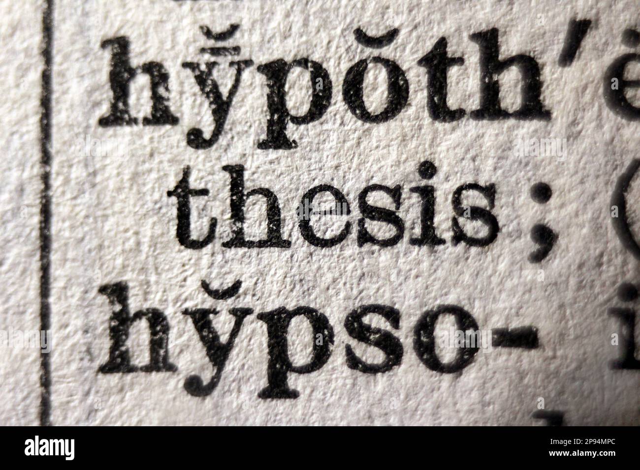 Definition of word thesis on dictionary page, close-up Stock Photo - Alamy
