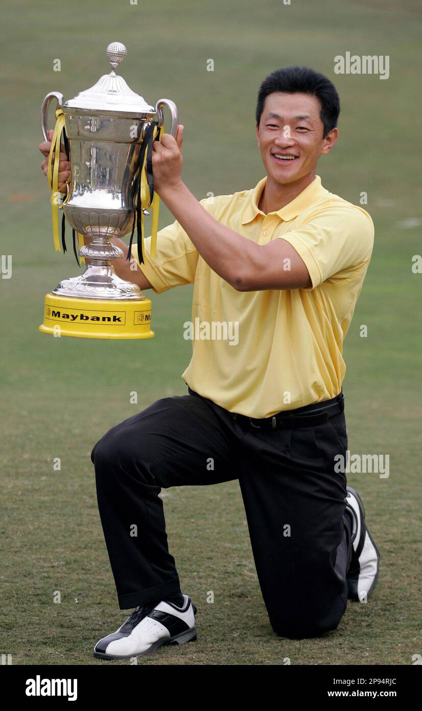 American Anthony Kang shows off his trophy after winning the Maybank ...