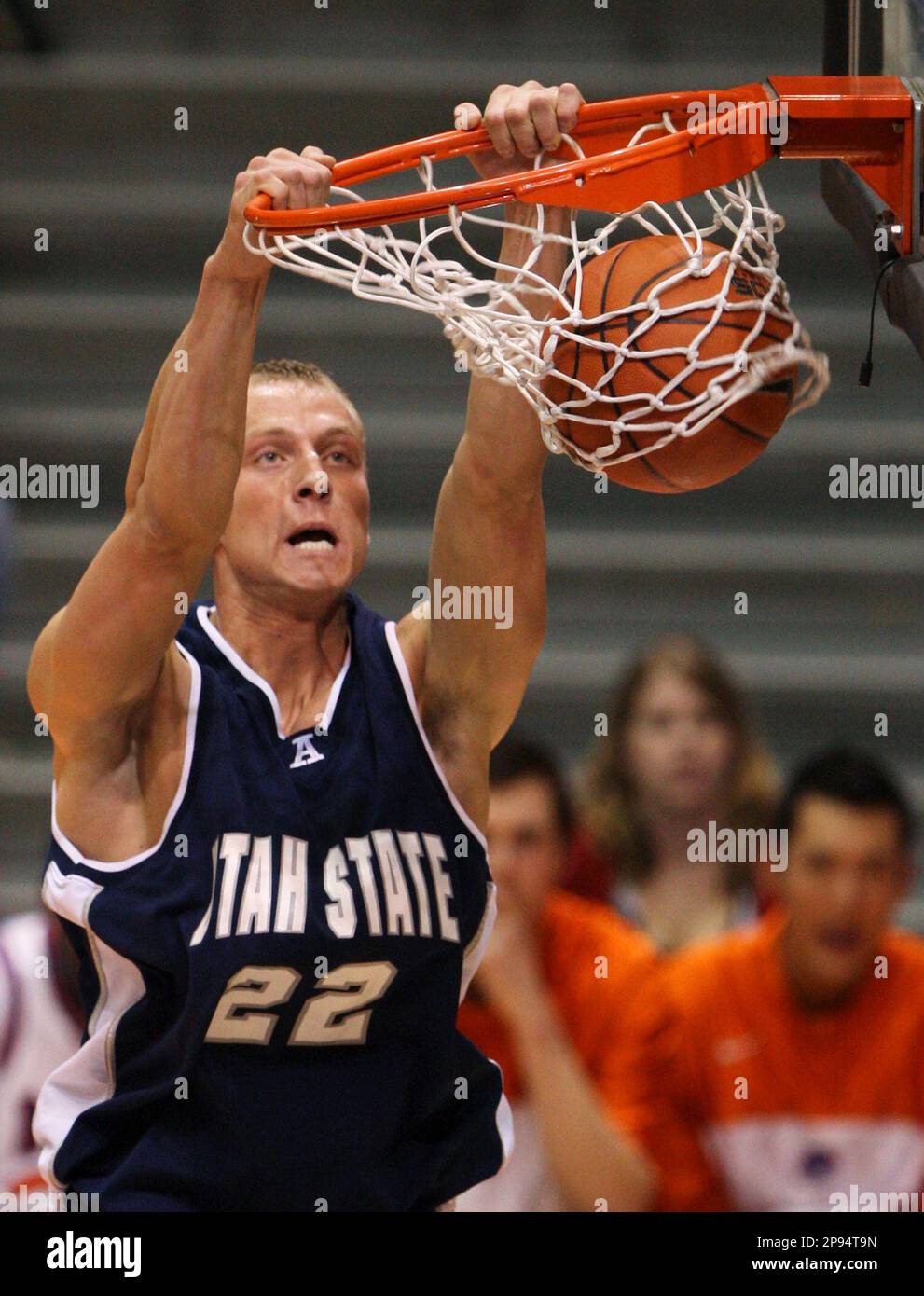 Utah State's Brady Jardine (22) dunks the ball against Boise State ...