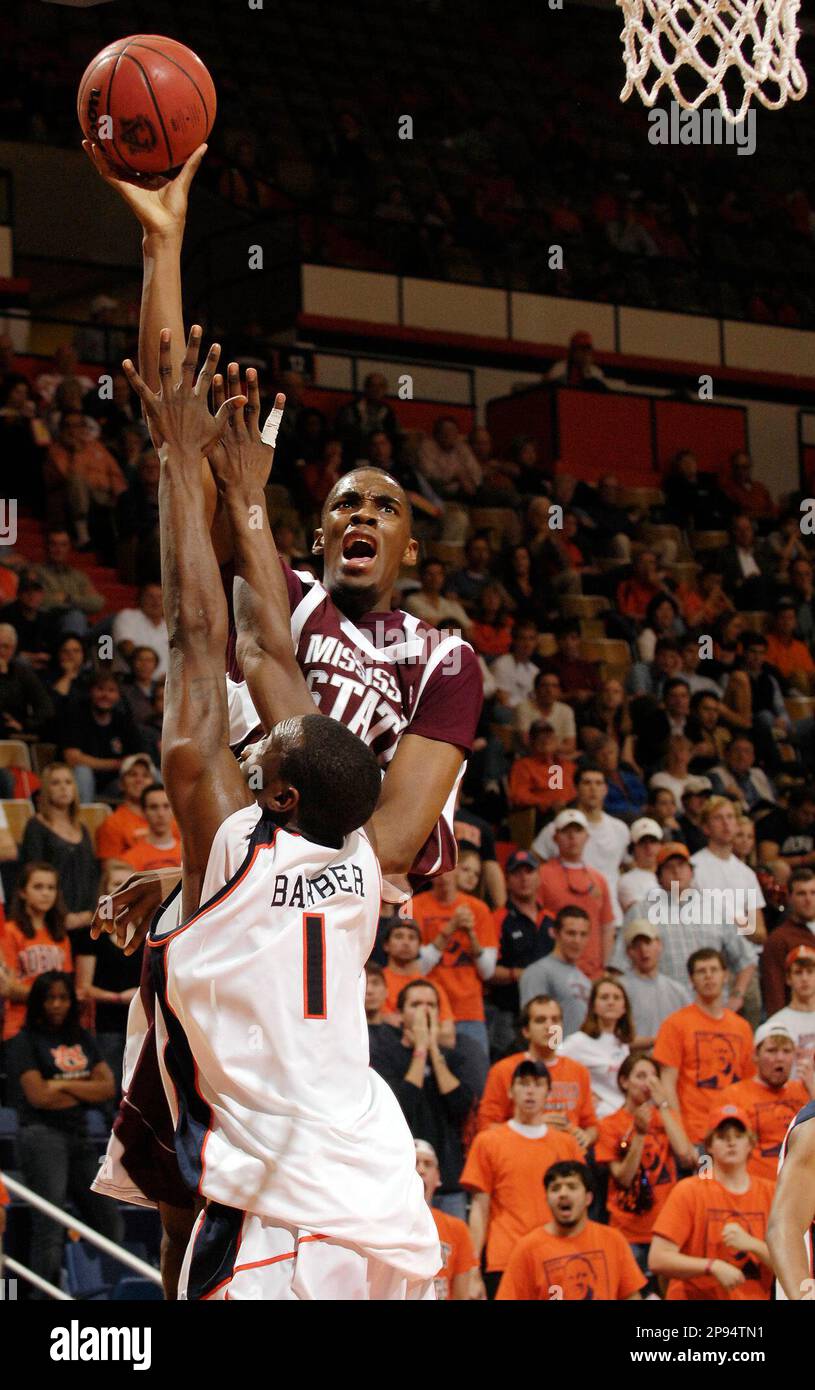 Mississippi State's Jarvis Varnado shoots over Auburn's Korvotney ...