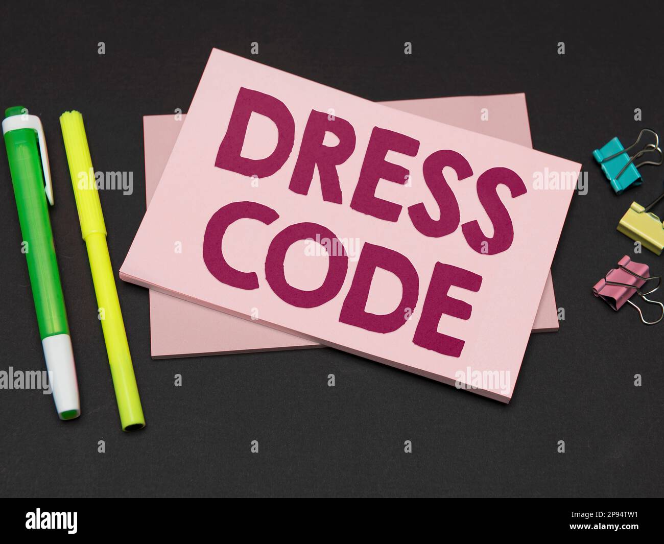 Conceptual caption Dress Code. Word Written on an accepted way of ...