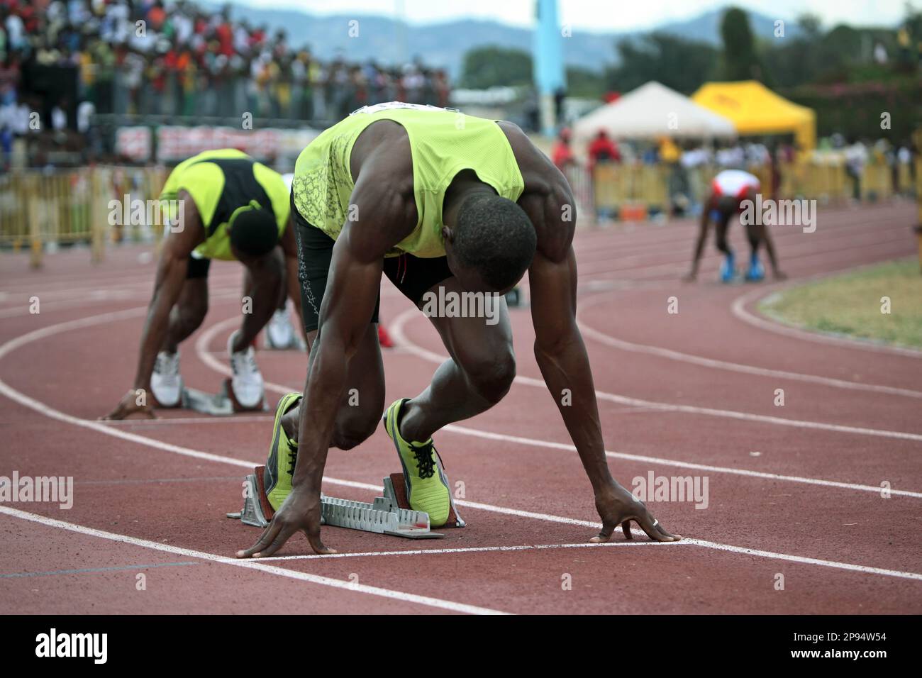 World champion Jamaican sprinter Usain Bolt, front, prepares to run the ...