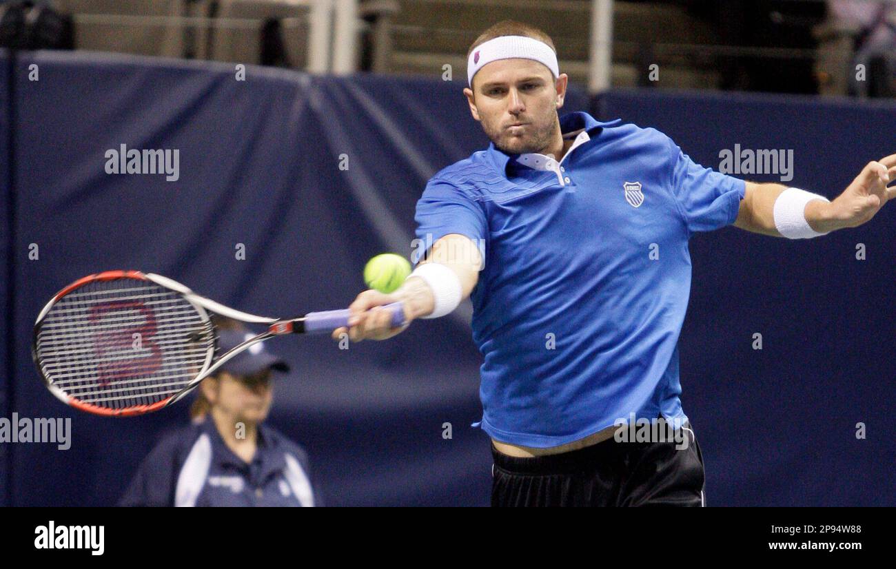 Mardy Fish returns the ball to James Blake during the semifinals of the ...