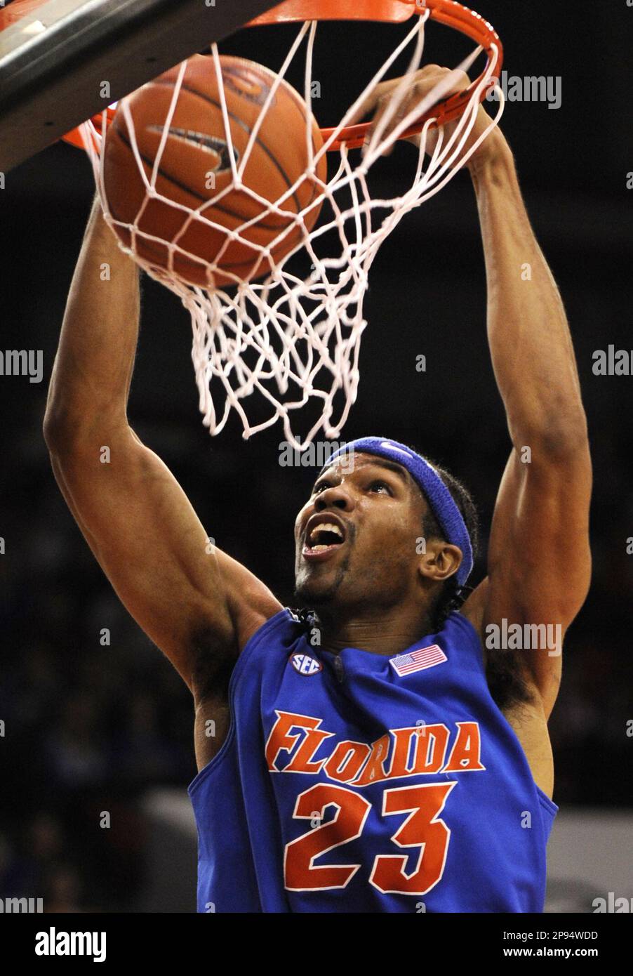Florida's Alex Tyus (23) scores two points during the first half of an ...