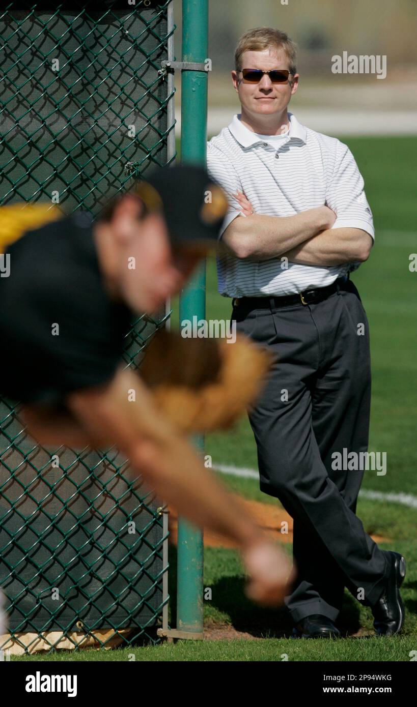 Pittsburgh Pirates general manager Neal Huntington, right, watches ...