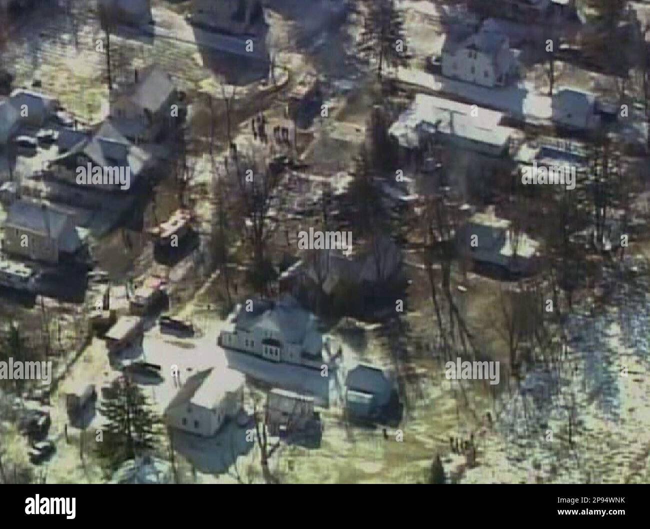 This image from television shows an aerial view of the crash site of ...