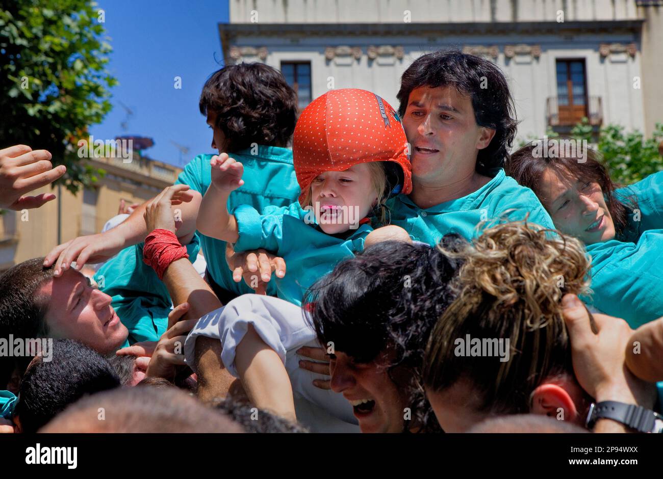 `Enxaneta´girl who rises to the top of the human tower. Castellers de ...