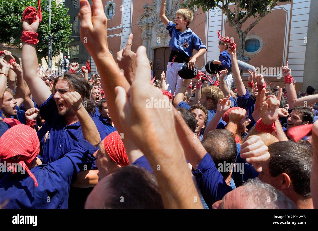 Celebrating a success.Capgrossos de Mataro.'Castellers' is a Catalan ...