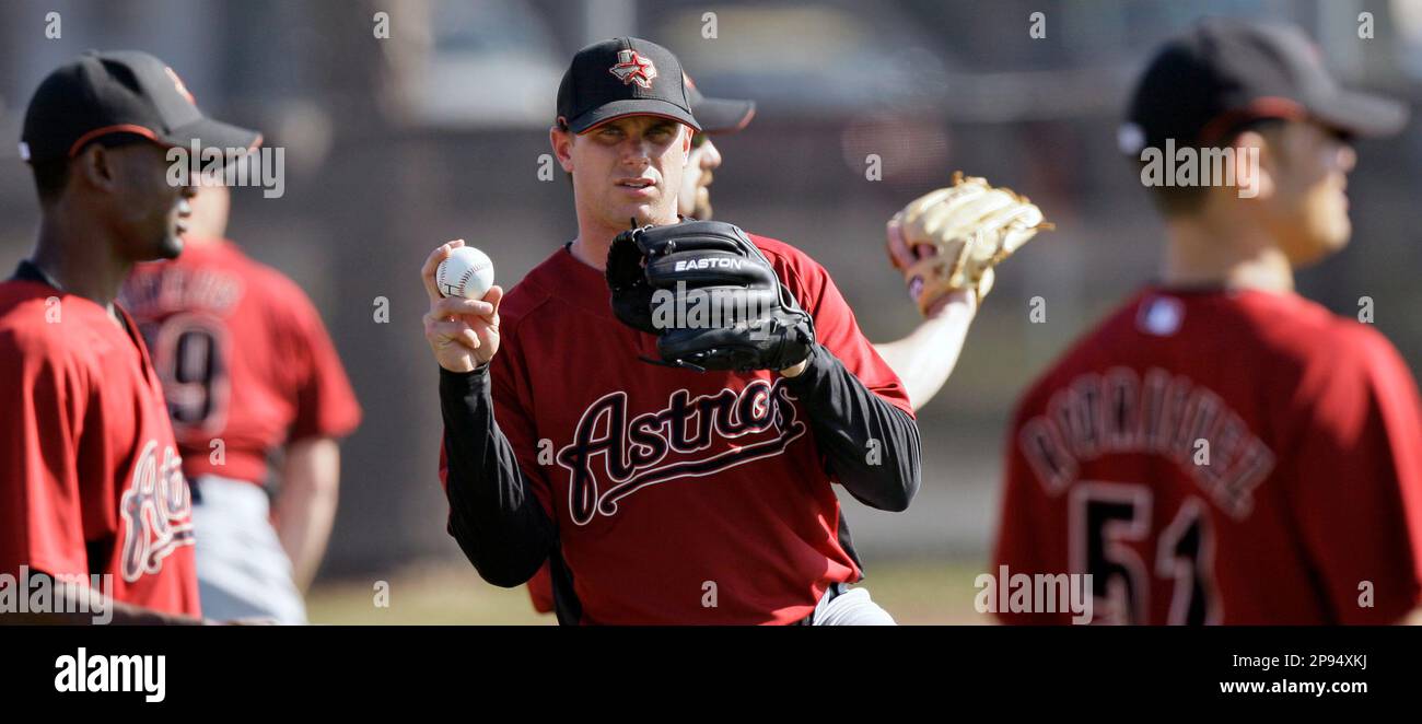 Houston Astros pitcher Brandon Backe, center, throws during a spring ...