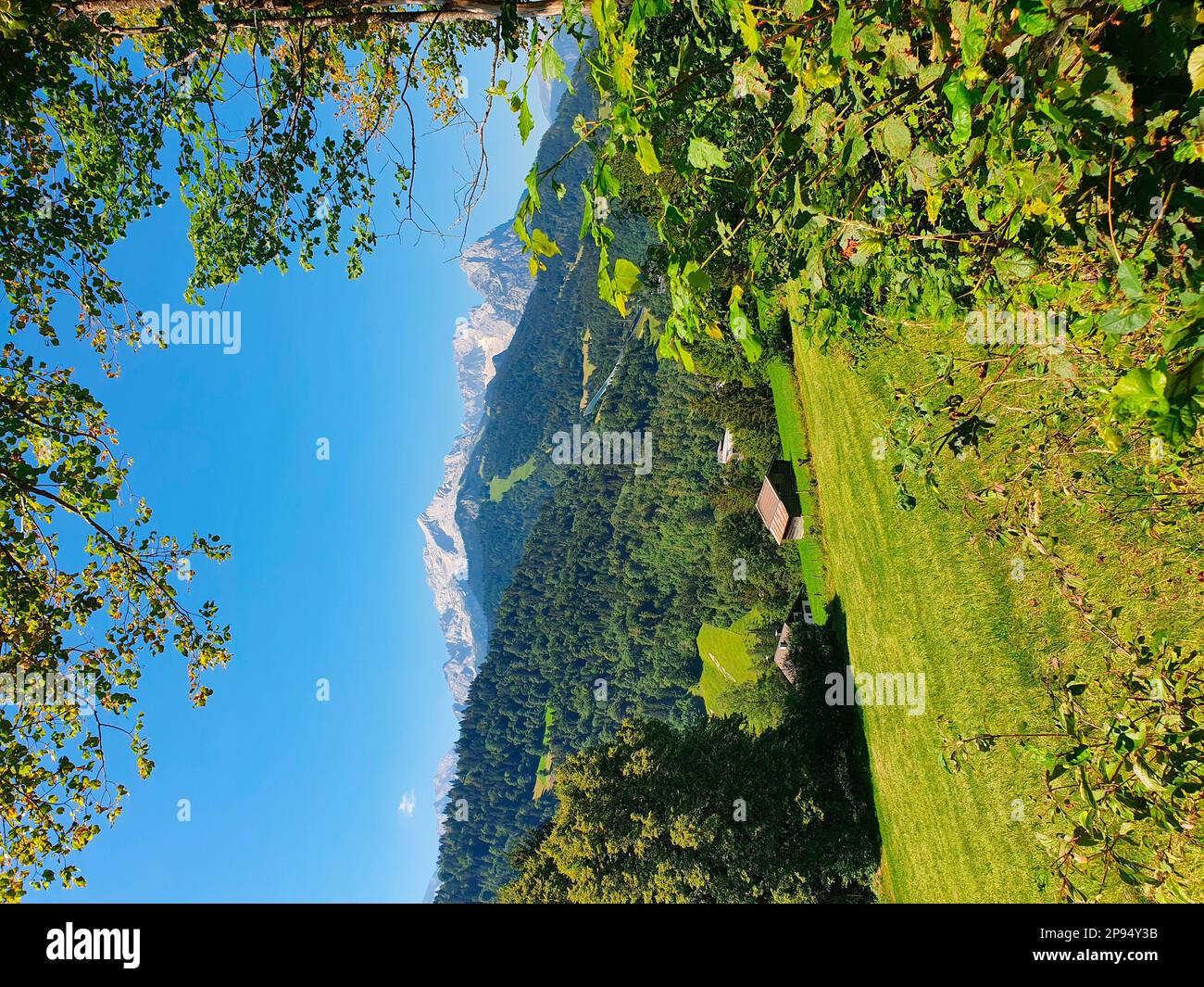 View over meadows to Alpspitze, Zugspitze and Waxenstein Stock Photo ...