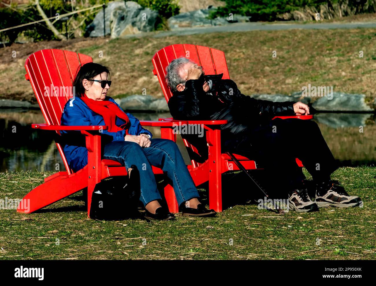 Couple sleeping in chairs on hi-res stock photography and images - Alamy