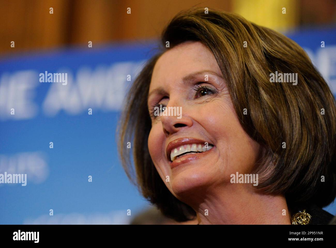 House Speaker Nancy Pelosi of Calif. smiles during a news conference on ...
